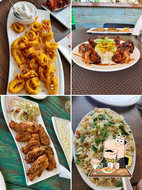 Om Lawn Family Bar & Restaurant, Siolim - Restaurant menu, prices and ...