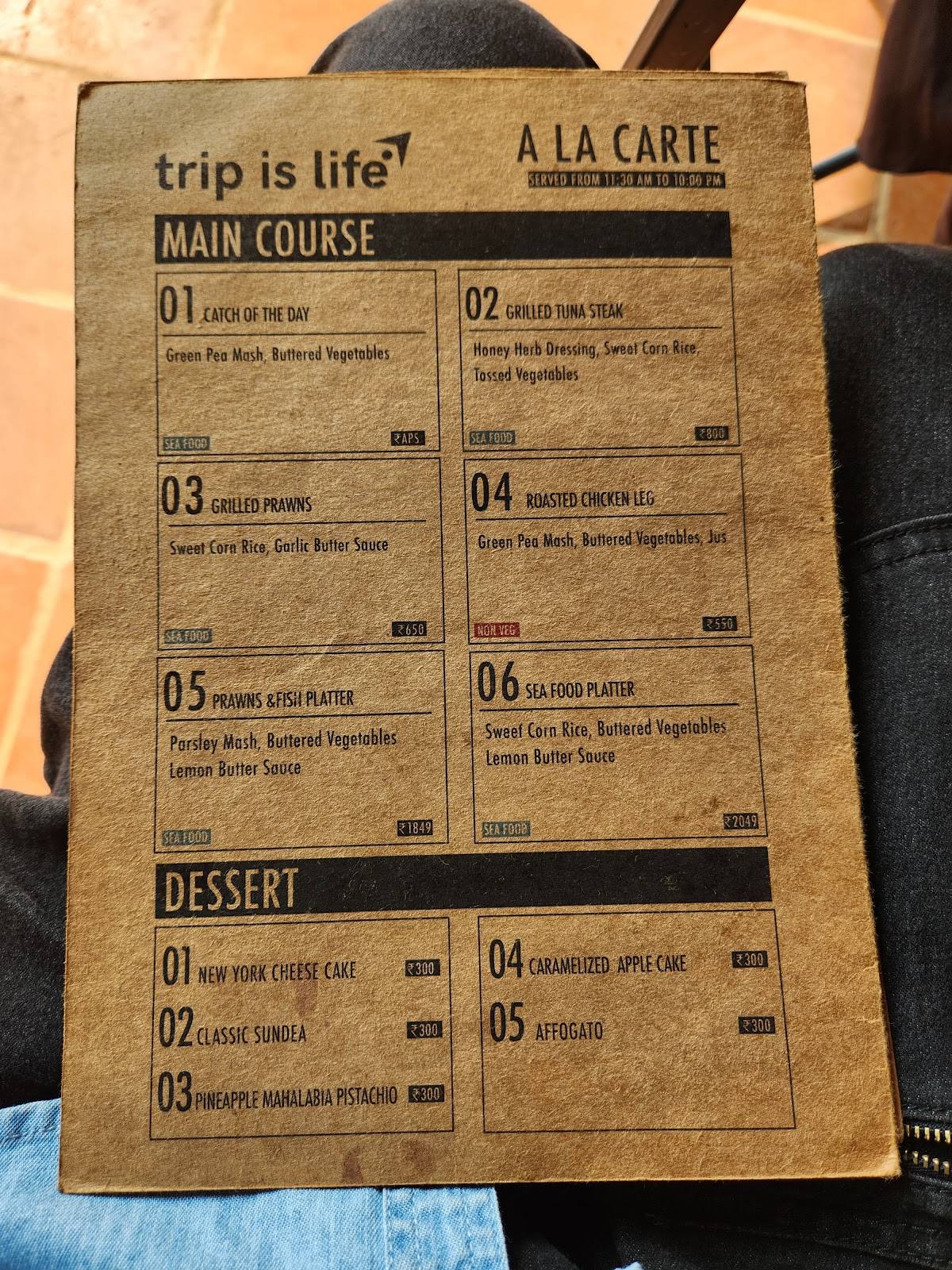 Menu at cafe trip is life, Varkala