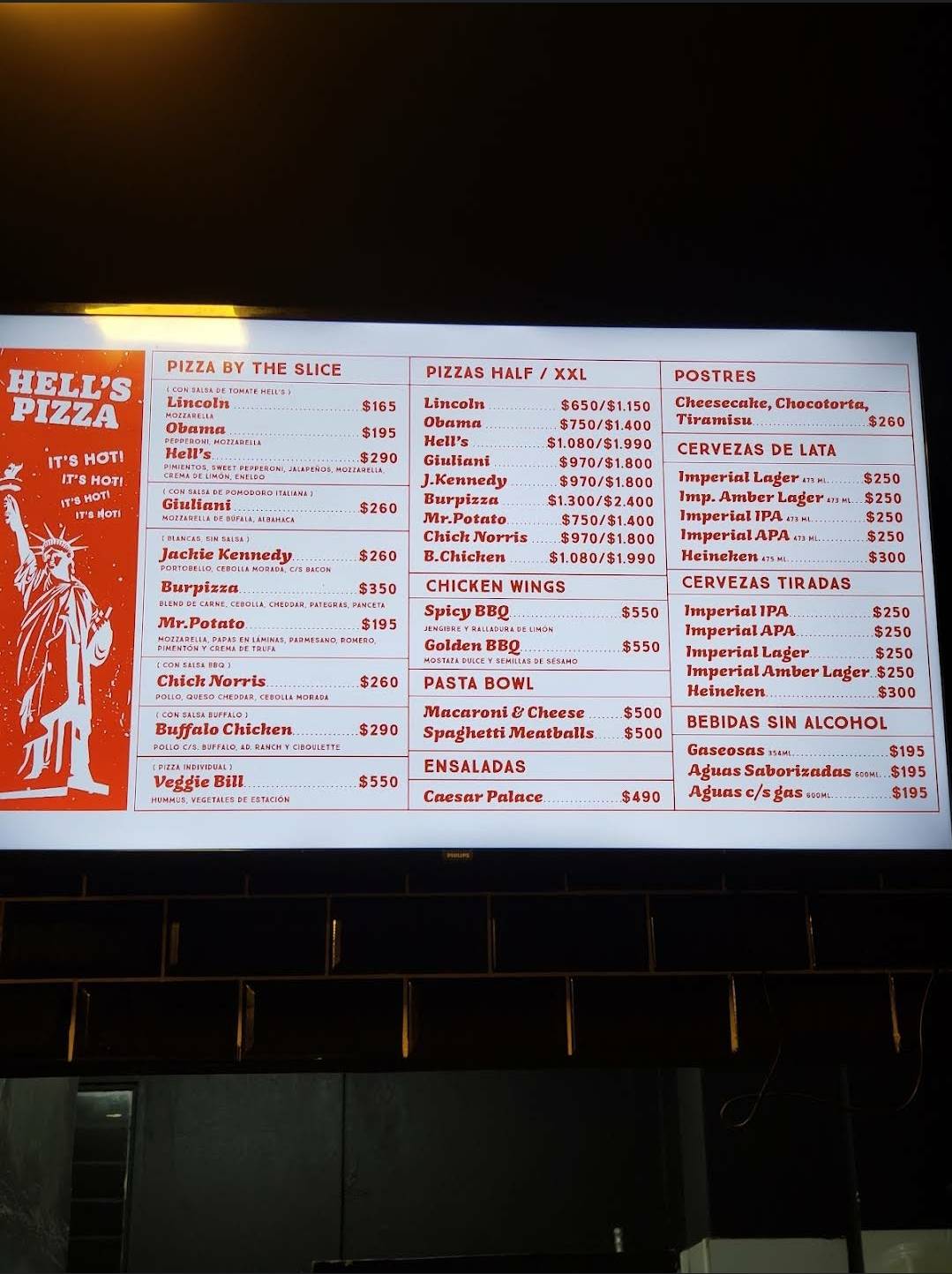 Menu at Hell’s Pizza restaurant, Martínez