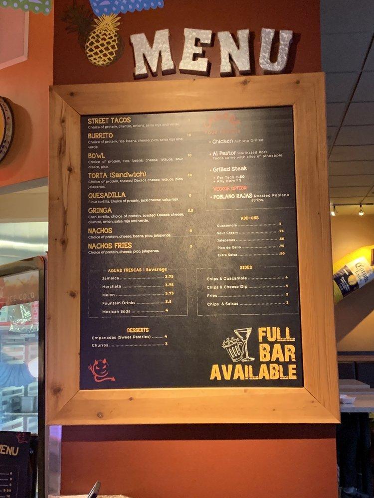 Menu at Dos Chamucos Taqueria restaurant, Seattle