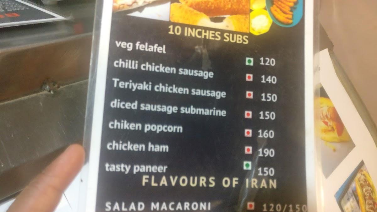 Menu at Holy smoke, Mangaluru, next to VM customs