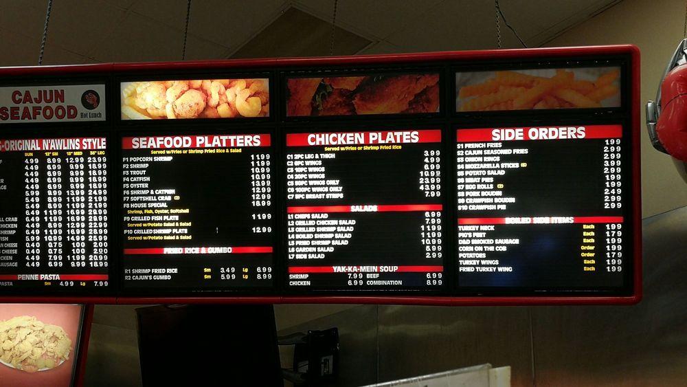 Menu at Cajun Seafood restaurant, New Orleans, N Claiborne Ave
