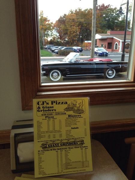Menu at CJ's Pizza and Giant Grinders pizzeria, Manchester