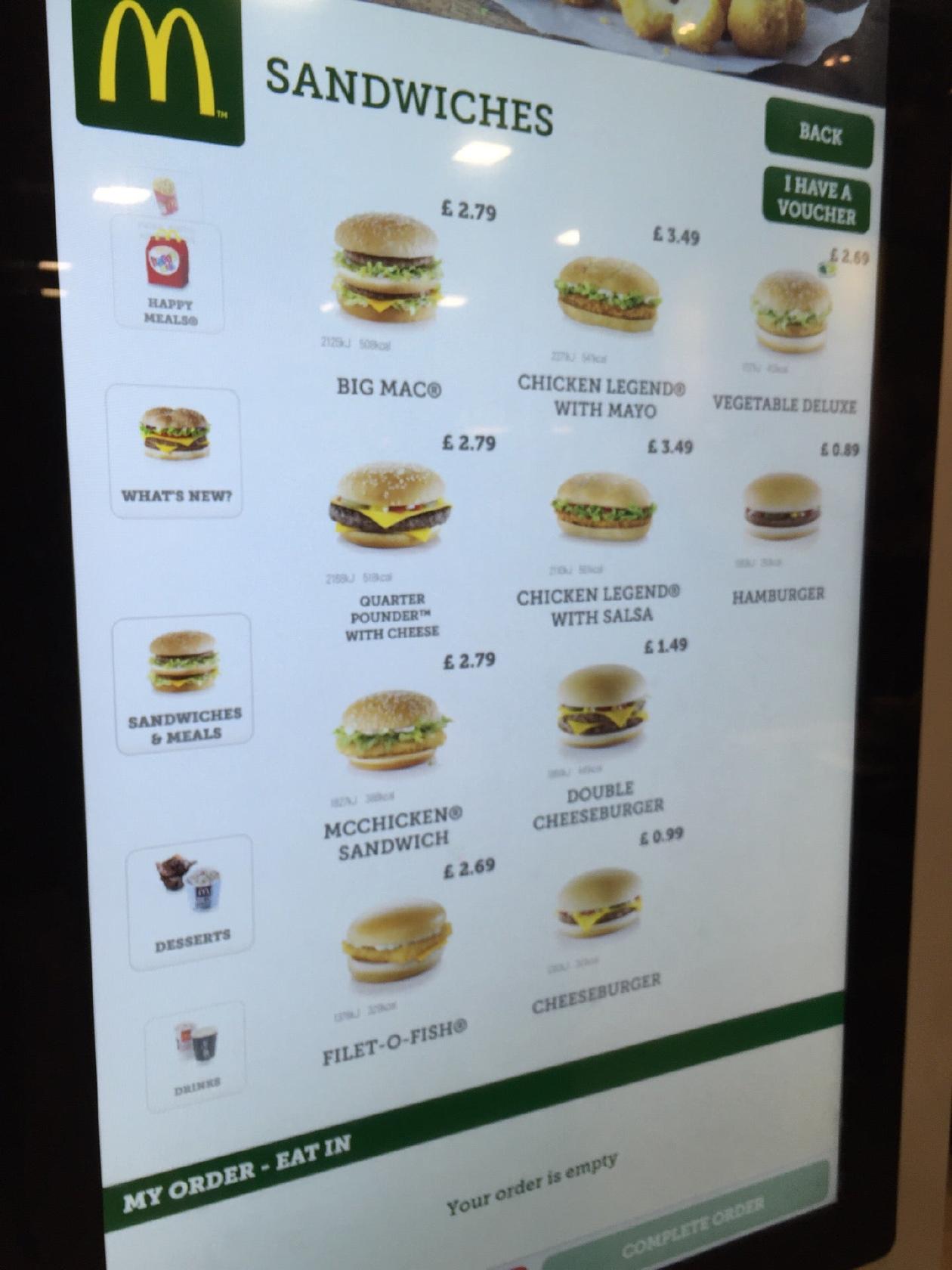Menu at McDonald's fast food, London, 4 Harben Parade (right