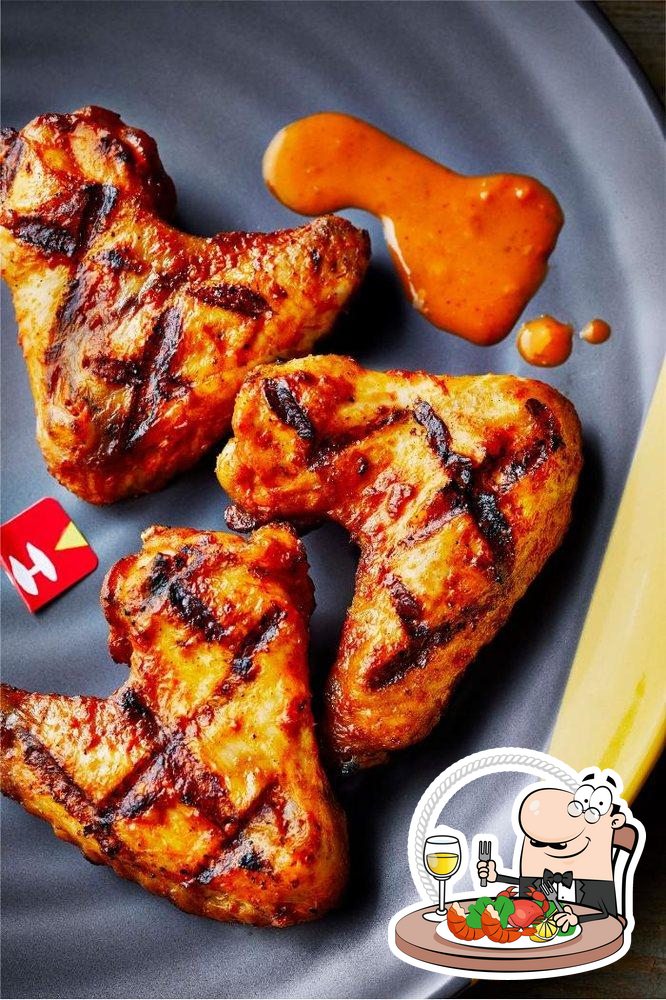 Nando's Whitechapel, 9-25 Mile End Rd in London - Restaurant menu and ...