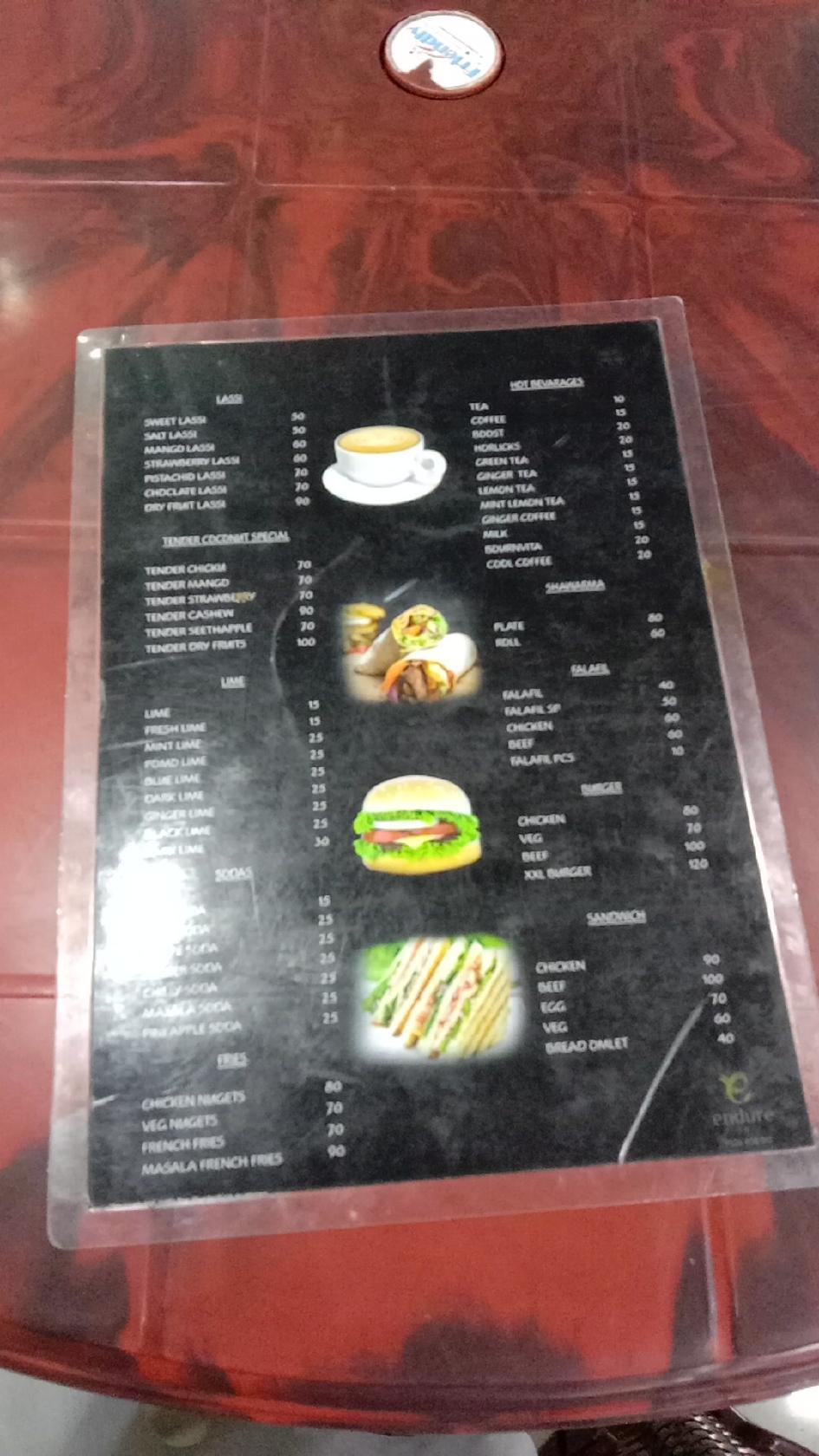 Menu at Merit Bakes, Ramanattukara