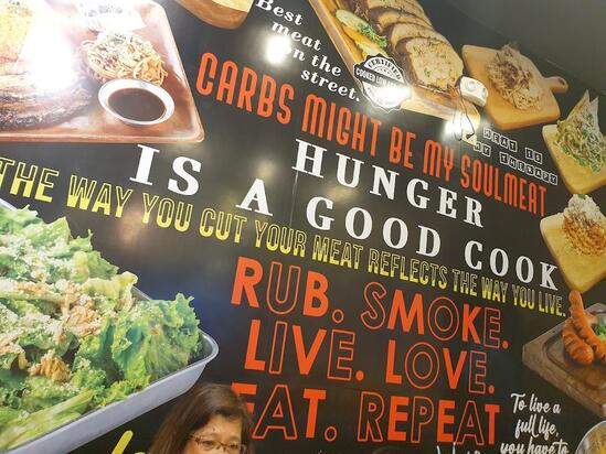 Menu at Scorched Smokehouse restaurant, Tanza