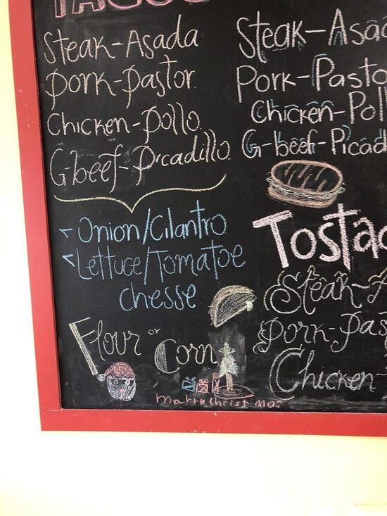 Menu at Leña al Fuego restaurant, Michigan City