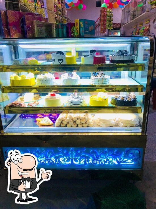 Menu at Rajan ice cream hub and bakery, Atarra