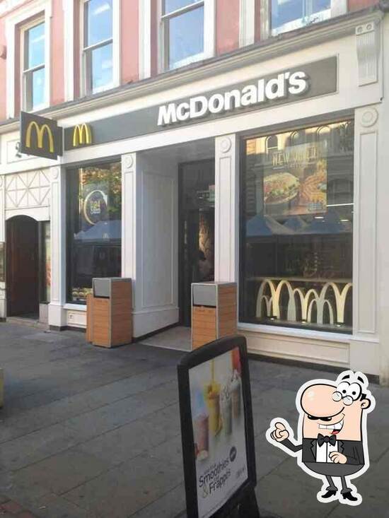 Menu at McDonald's fast food, Manchester, 18 St Anns Square