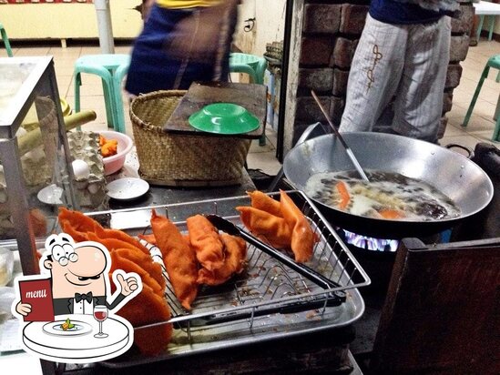 Menu at Glory’s Empanada restaurant, Batac